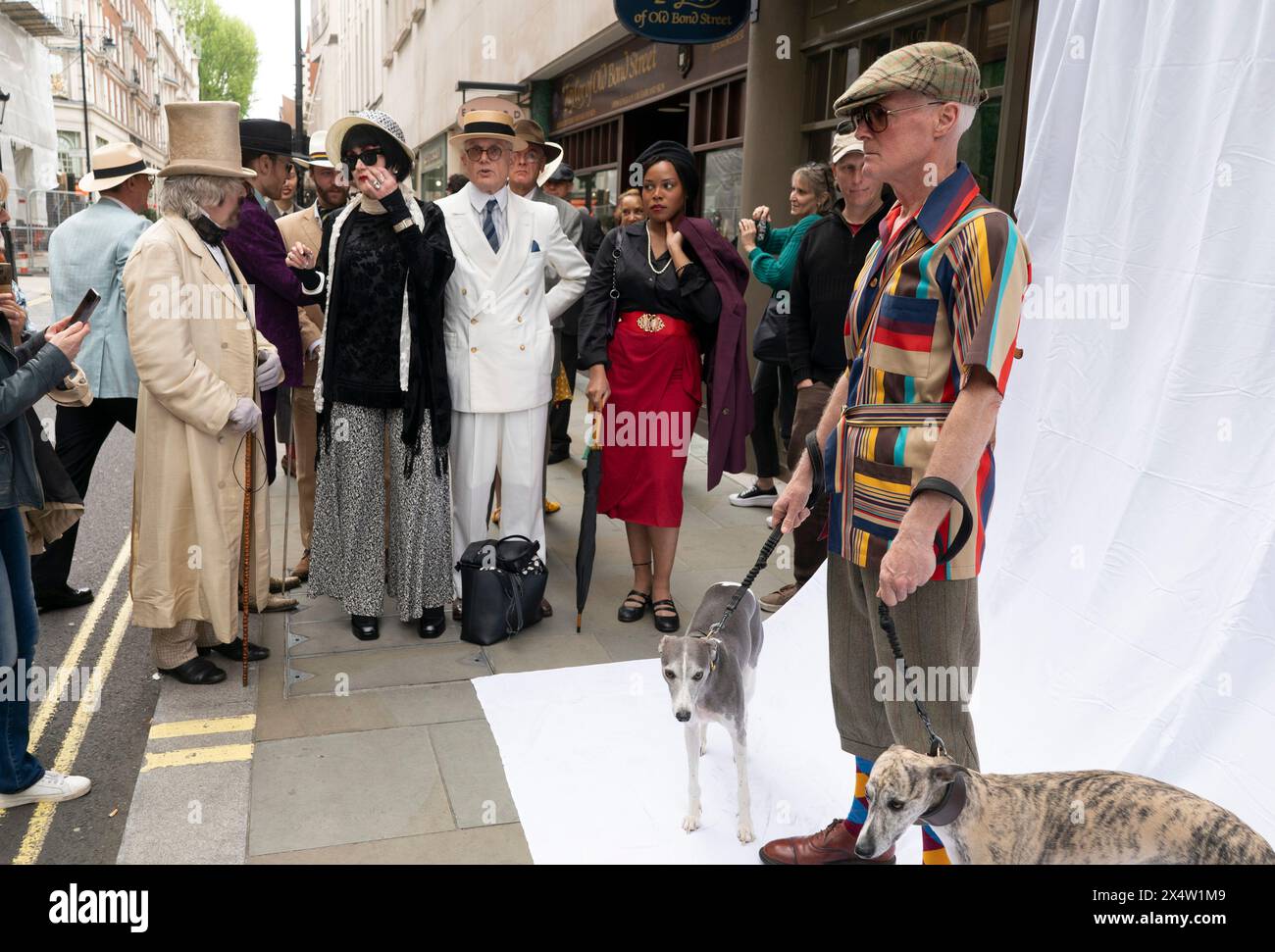 People attend the fourth Grand Flaneur Walk in Westminster, central ...
