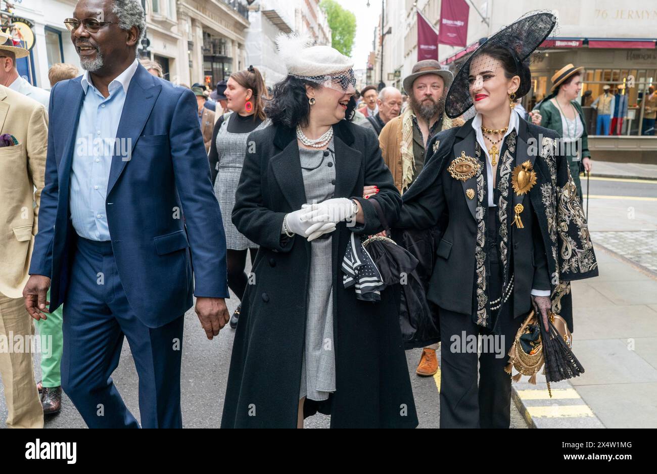 People attend the fourth Grand Flaneur Walk in Westminster, central ...
