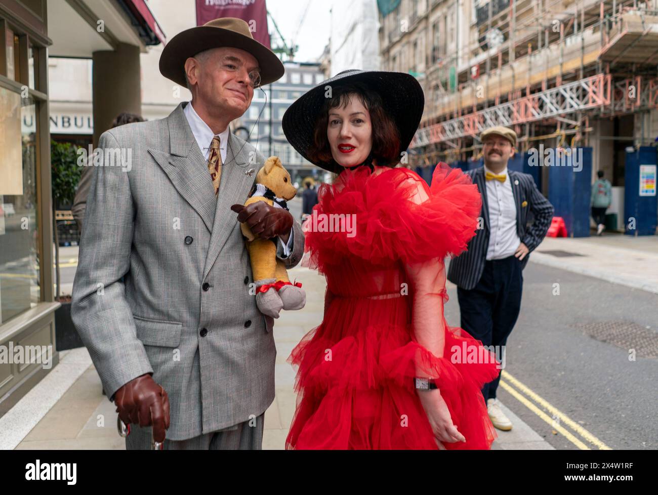 People attend the fourth Grand Flaneur Walk in Westminster, central ...