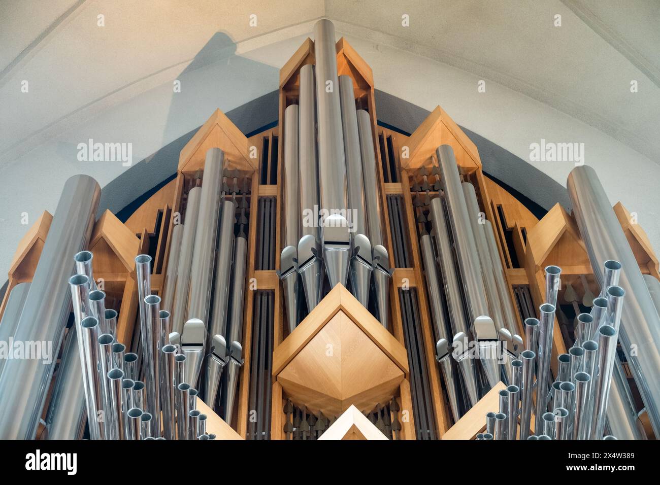 Large organ with many keys is shown Reikiavik cathedral. The organ is ...