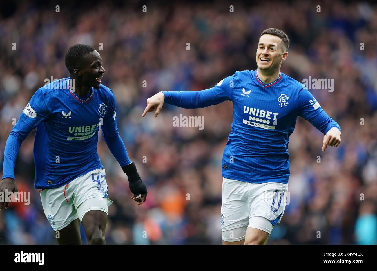 Rangers' Tom Lawrence celebrates scoring their third goal of the game ...