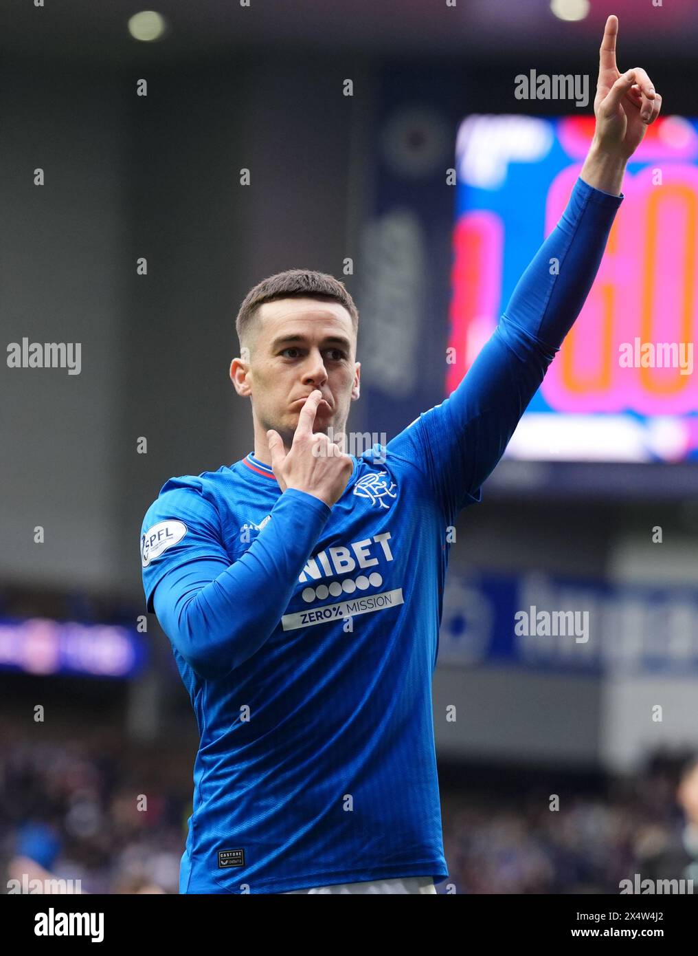 Rangers' Tom Lawrence celebrates scoring their third goal of the game ...