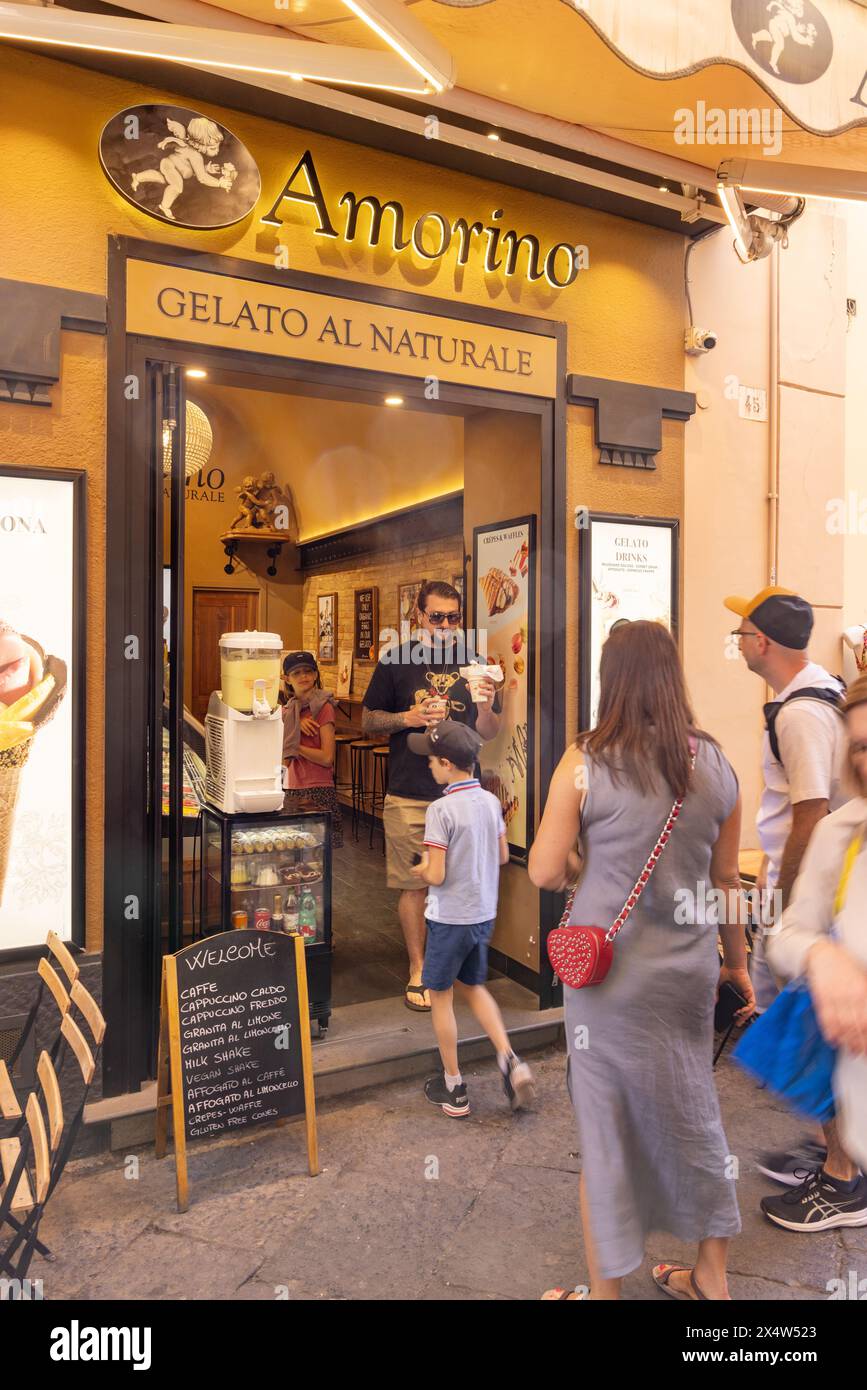 Italy ice cream; a family with children entering a gelateria, Sorrento ...