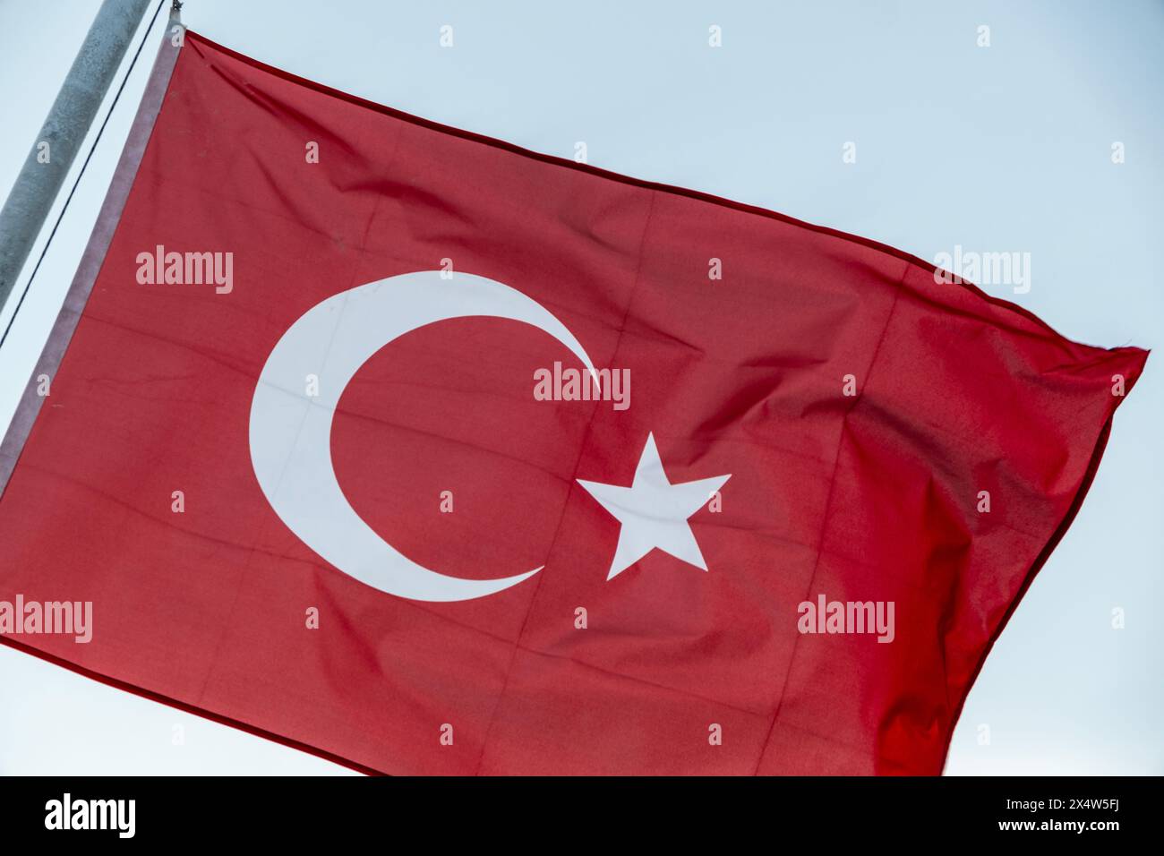 Vibrant red turkish flag waving hi-res stock photography and images - Alamy