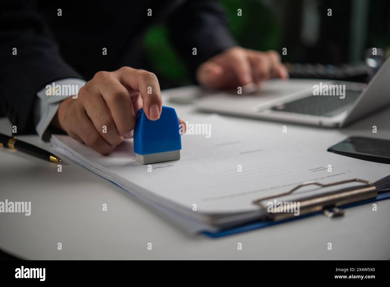 Hand stamping approval on an official document, workflow concept Stock ...