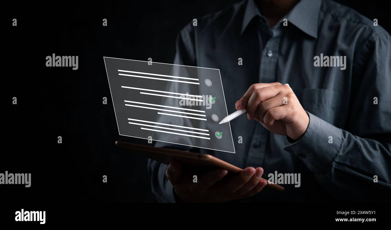 person hand holding pen digital checklist on a tablet with stylus ...