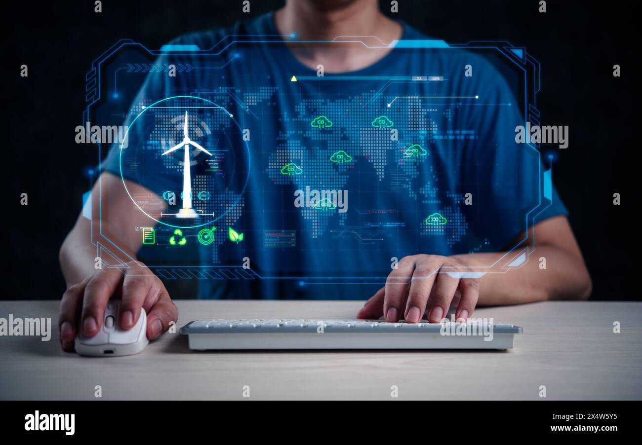 Individual with a computer analyzes wind turbine data on a global ...
