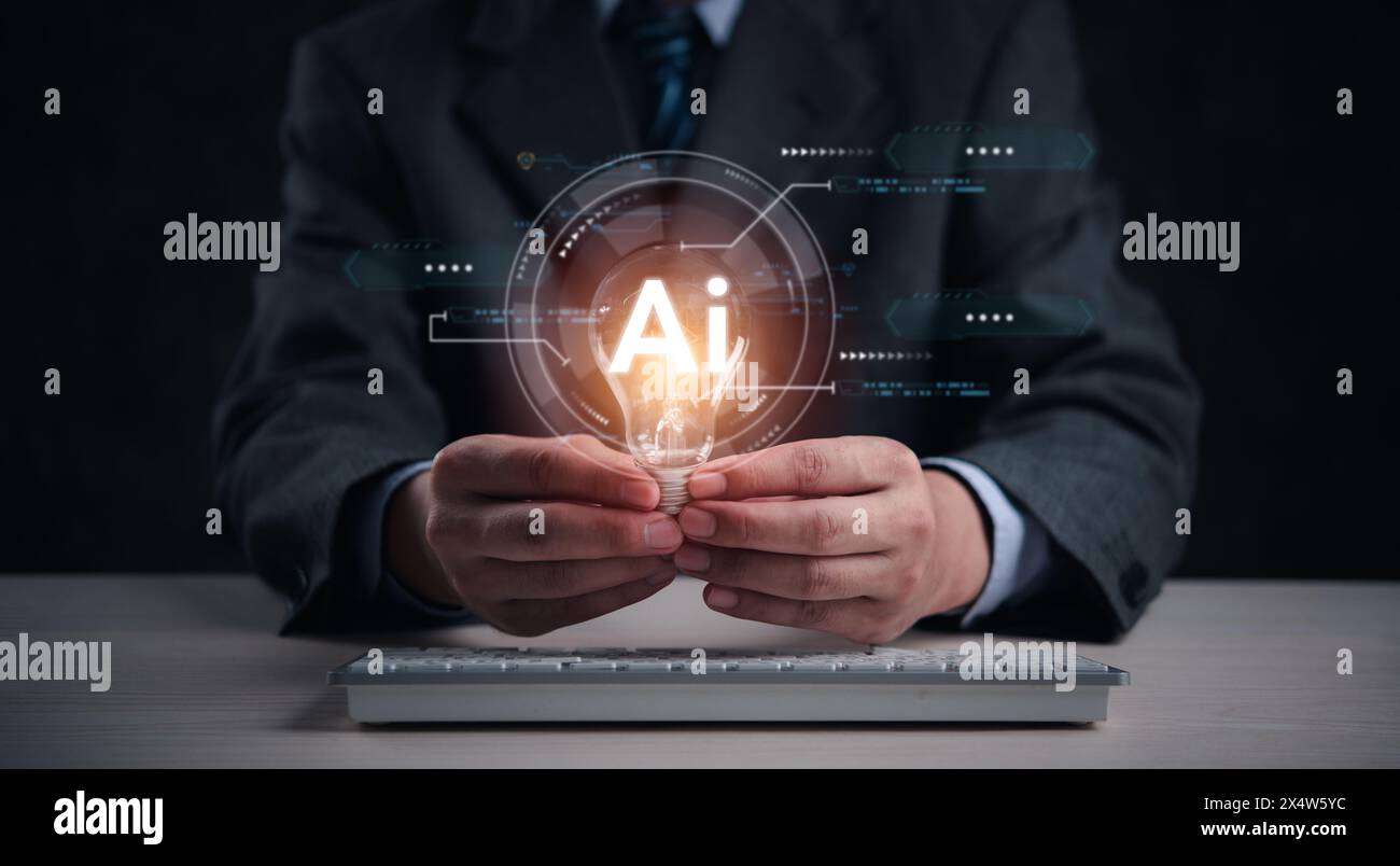 Business man Holding Light Bulb with AI artificial intelligence Concept ...