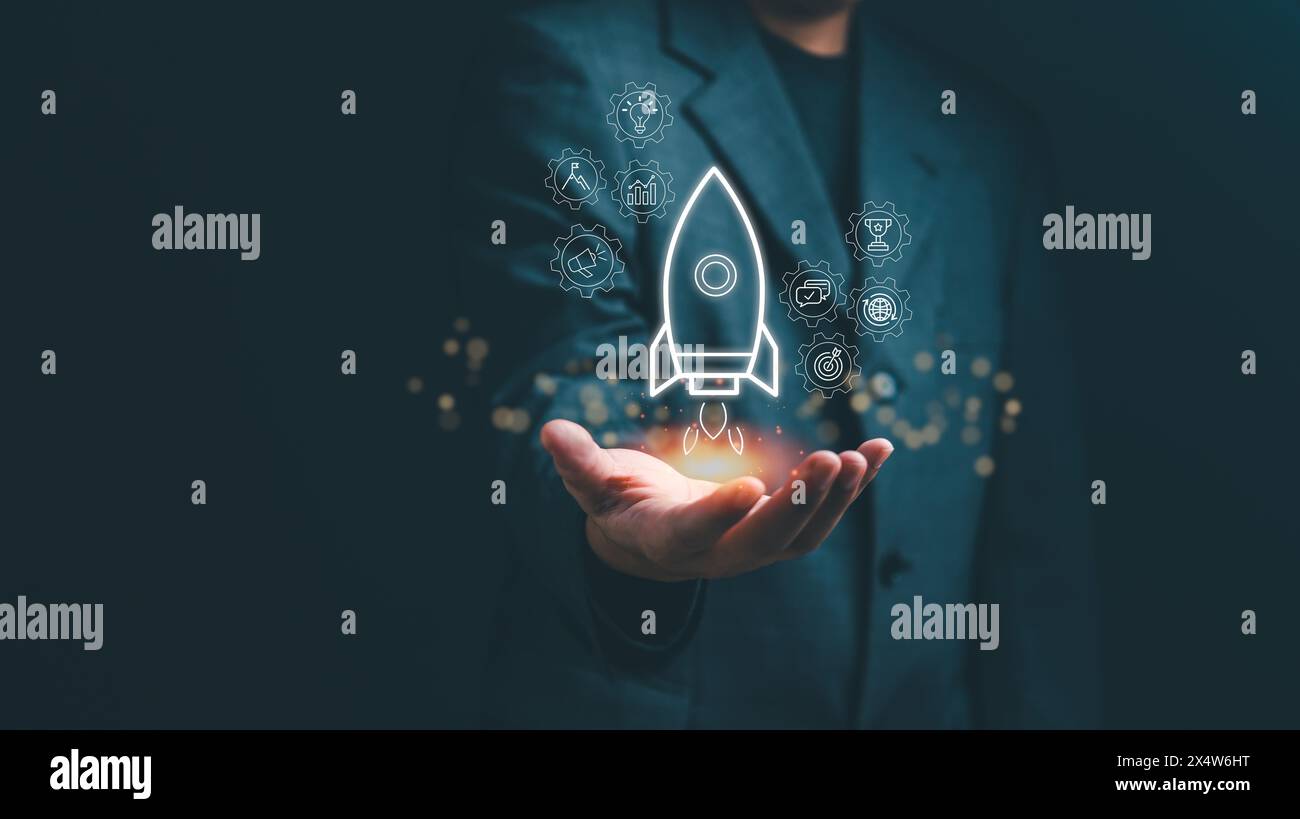 Business professional presenting a holographic startup rocket concept ...