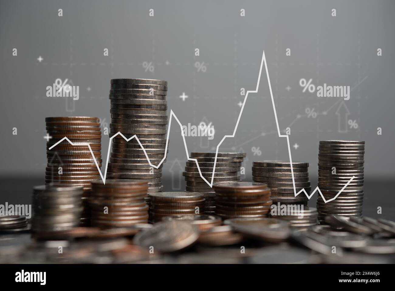Stacks of coins are contrasted against a digital graph, symbolizing ...
