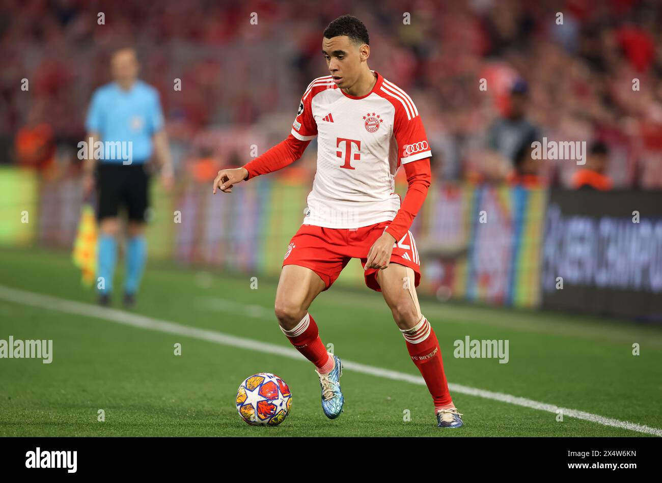 MUNICH, GERMANY - APRIL 30: Jamal Musiala of Bayern Muenchen runs with ...