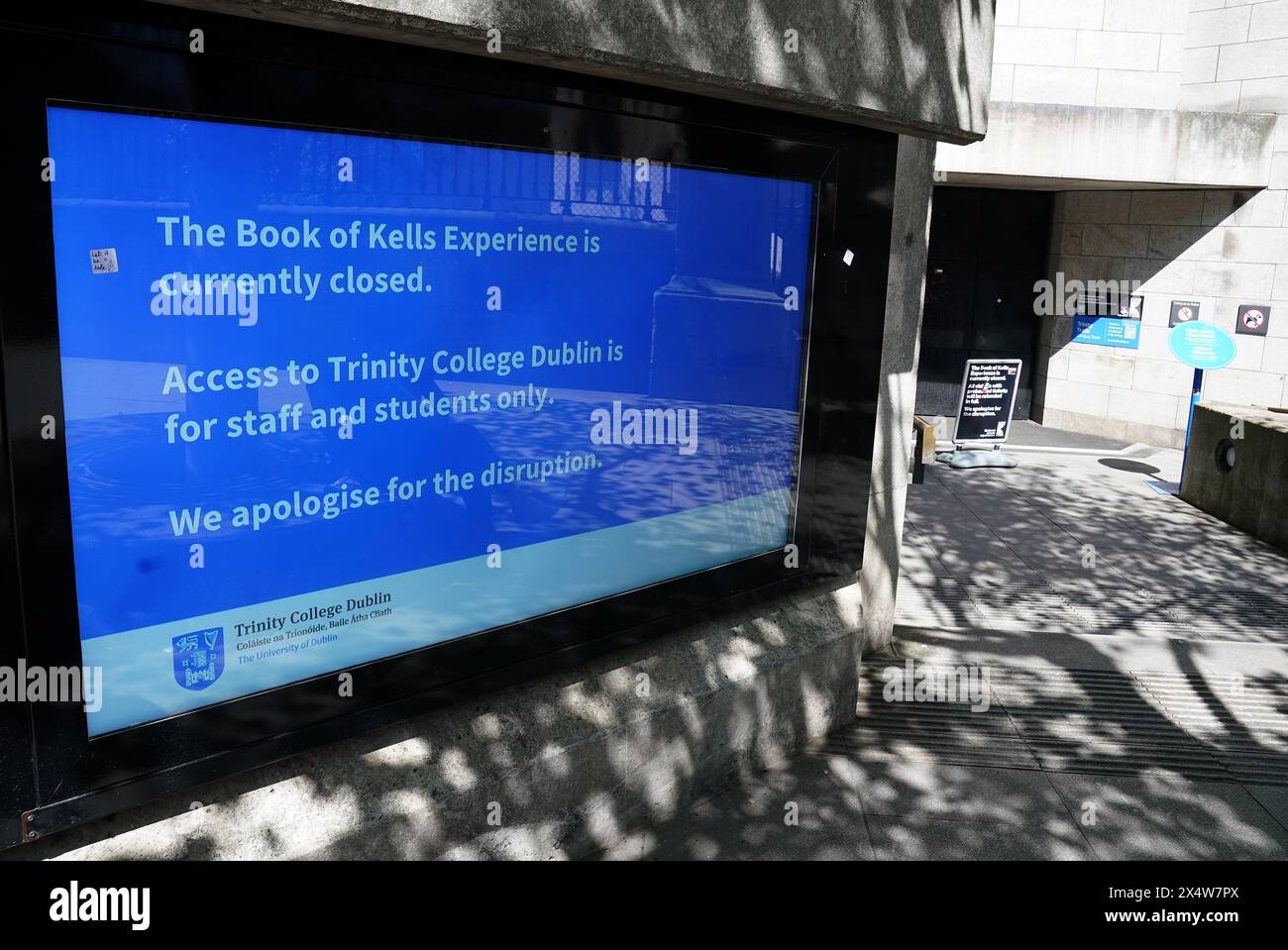 A notice at an entrance to Trinity College in Dublin. The campus ...