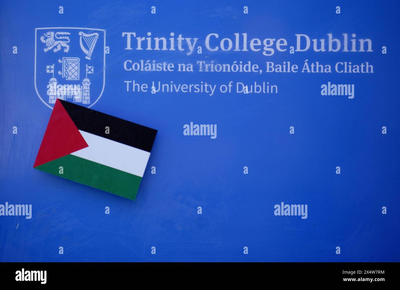 A Palestine sticker on a sign at the entrance to Trinity College in ...