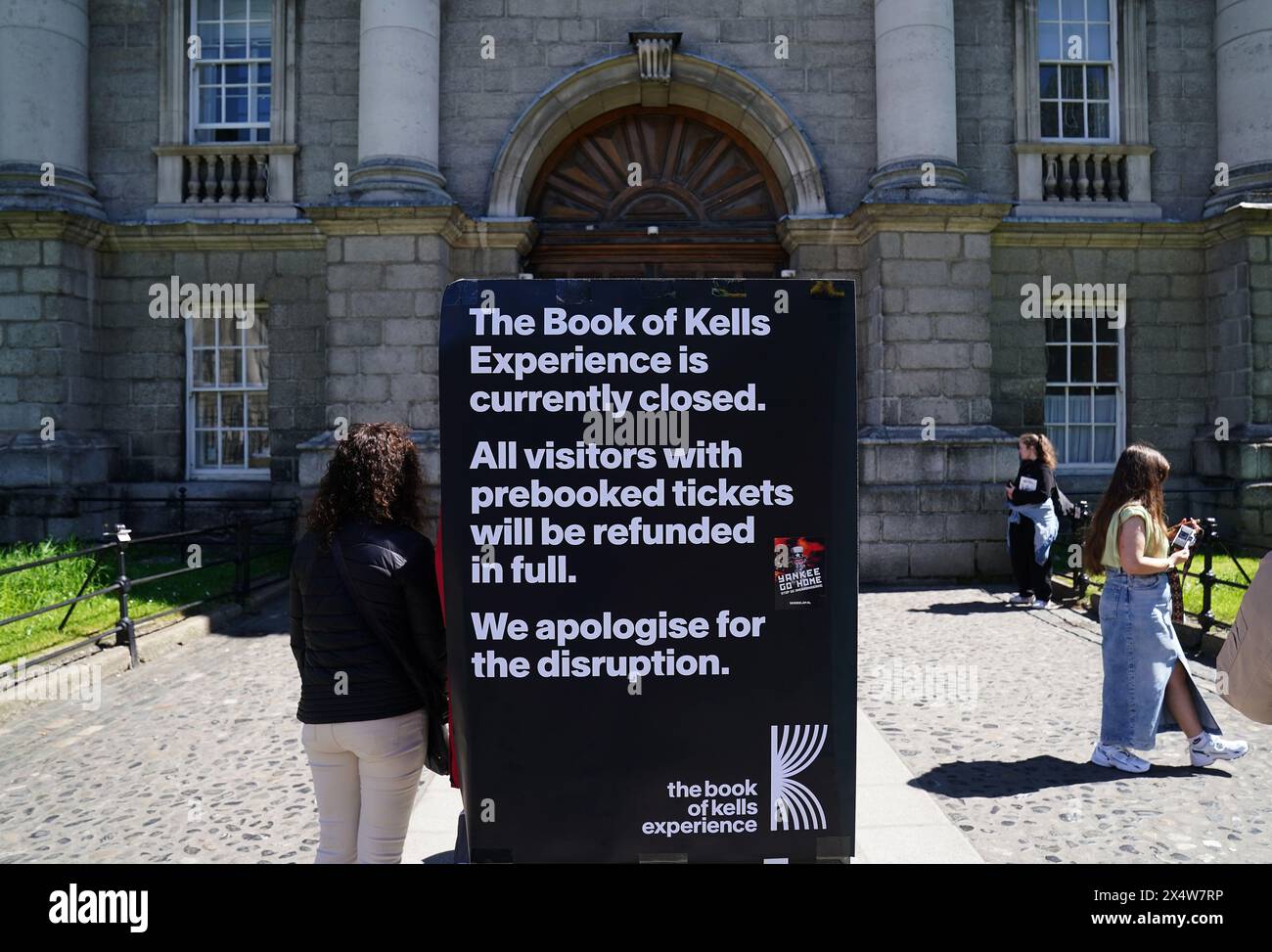 A sign at the entrance to Trinity College in Dublin. The campus remains ...
