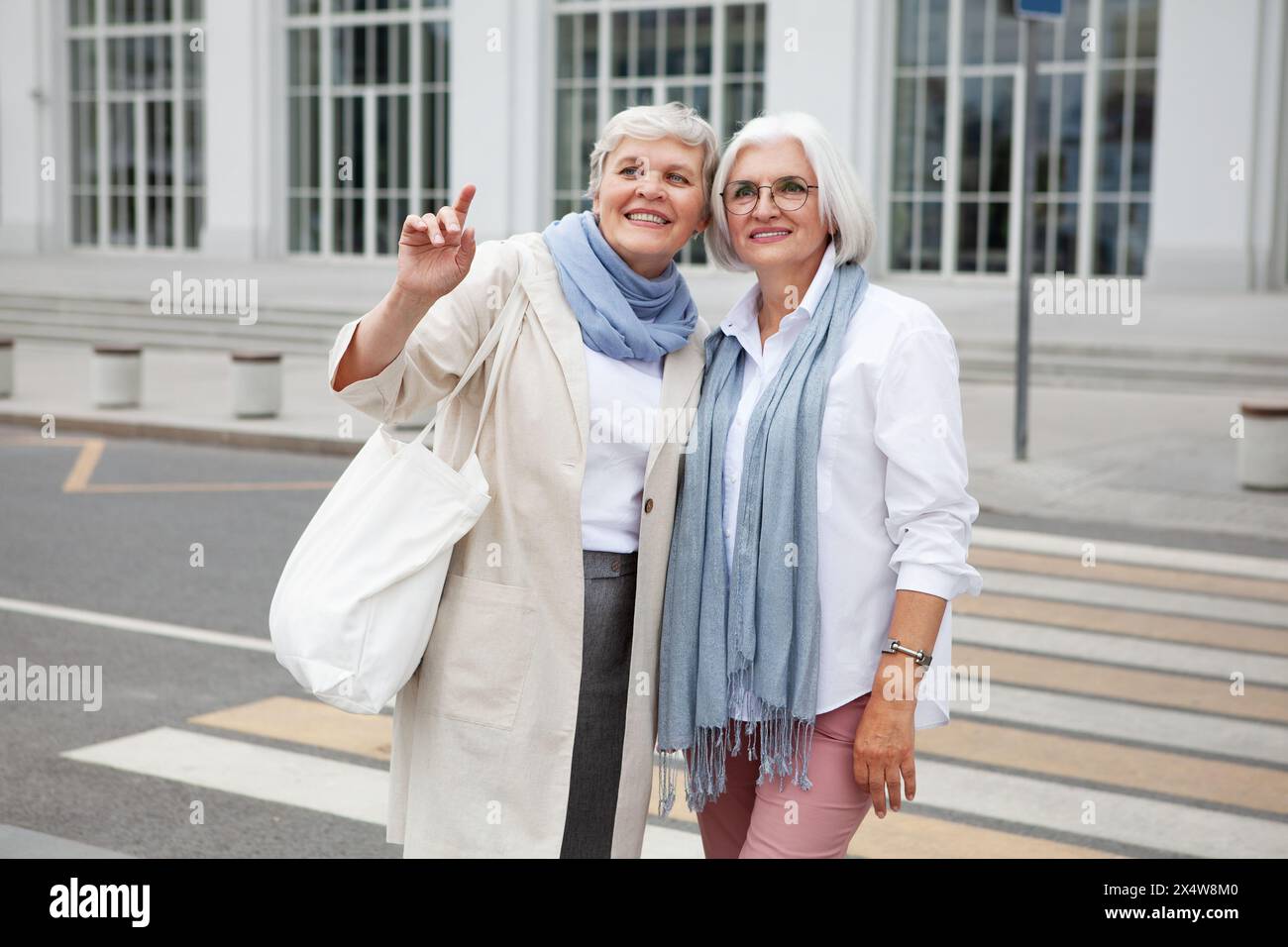 Portrait of beautiful smiling elderly senior women with gray hair ...