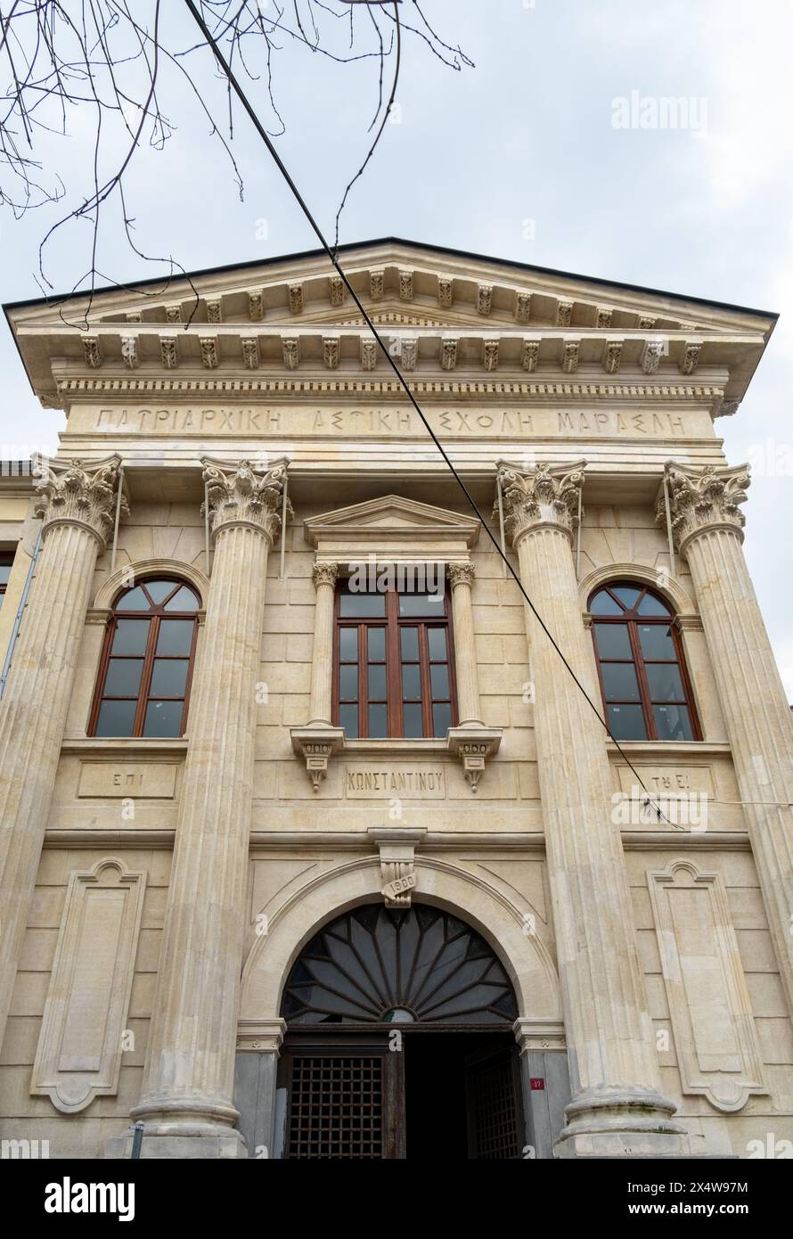 Imposing front view of a historic stone house in Istanbul's Balat ...