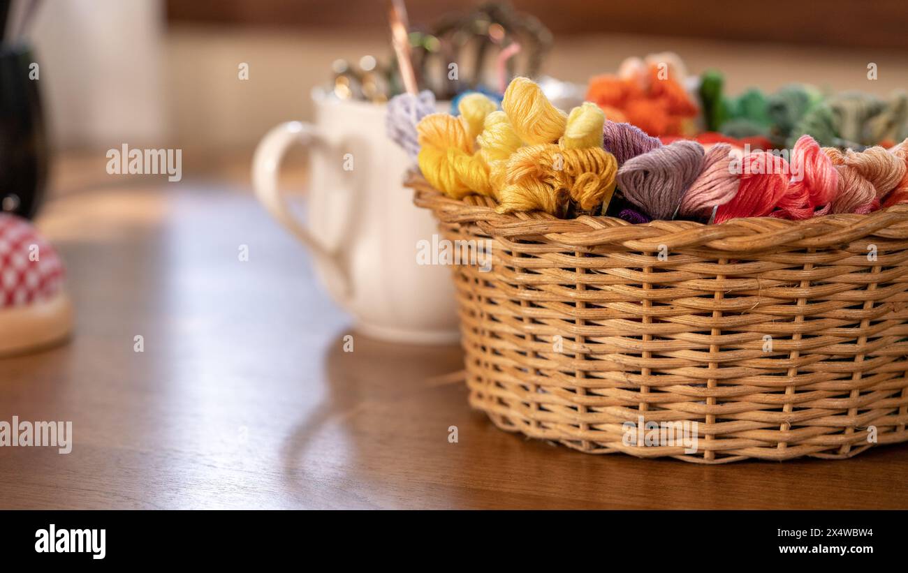 Crafter's Paradise: Vibrant Embroidery Threads in a Wicker Basket Stock ...