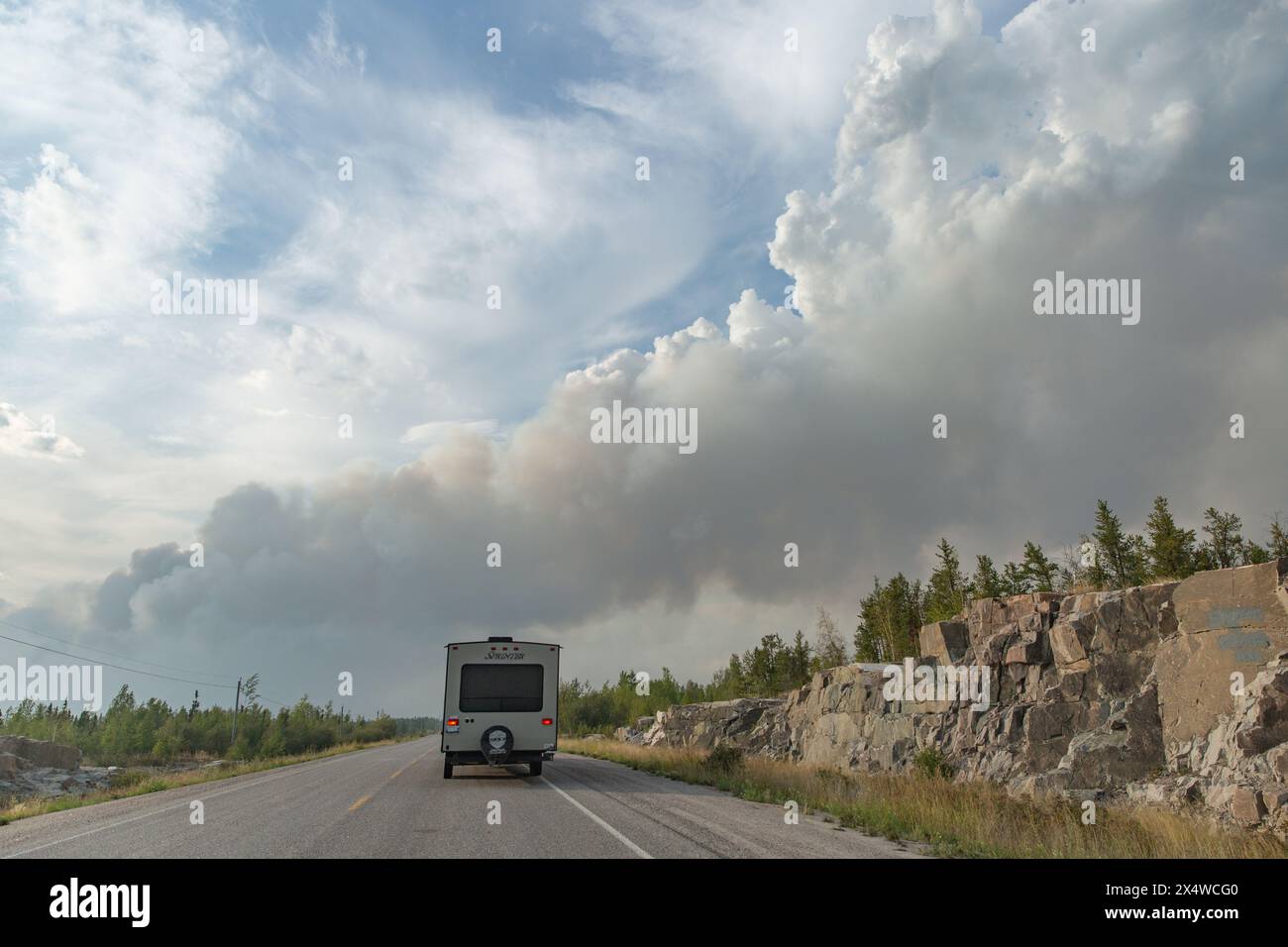 Recreational vehicle along Highway 3 during wildfire evacuation in ...