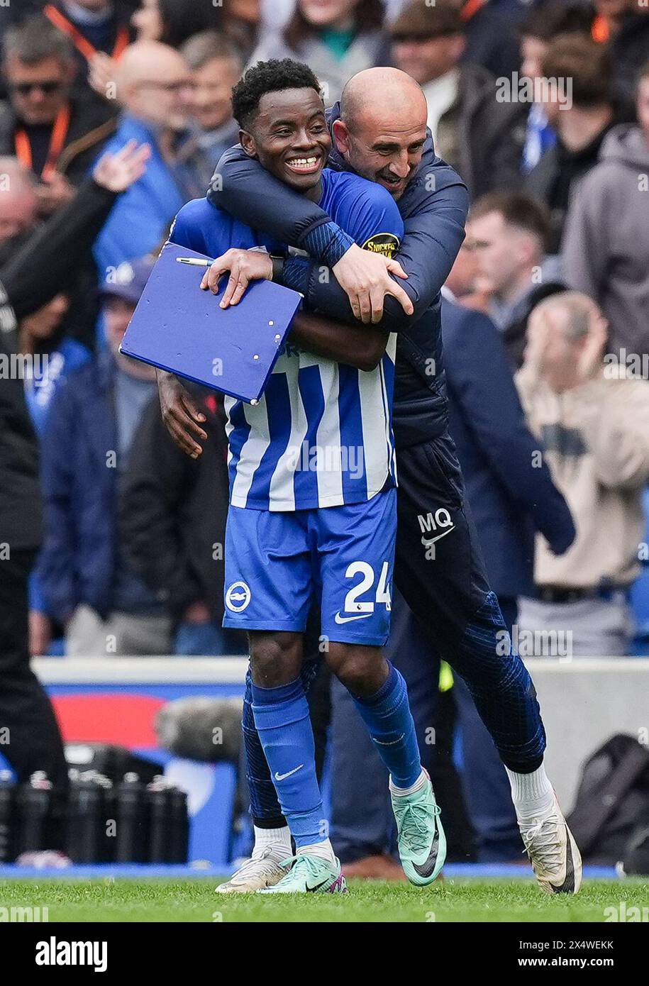 Brighton and Hove Albion's Simon Adingra celebrates following the ...