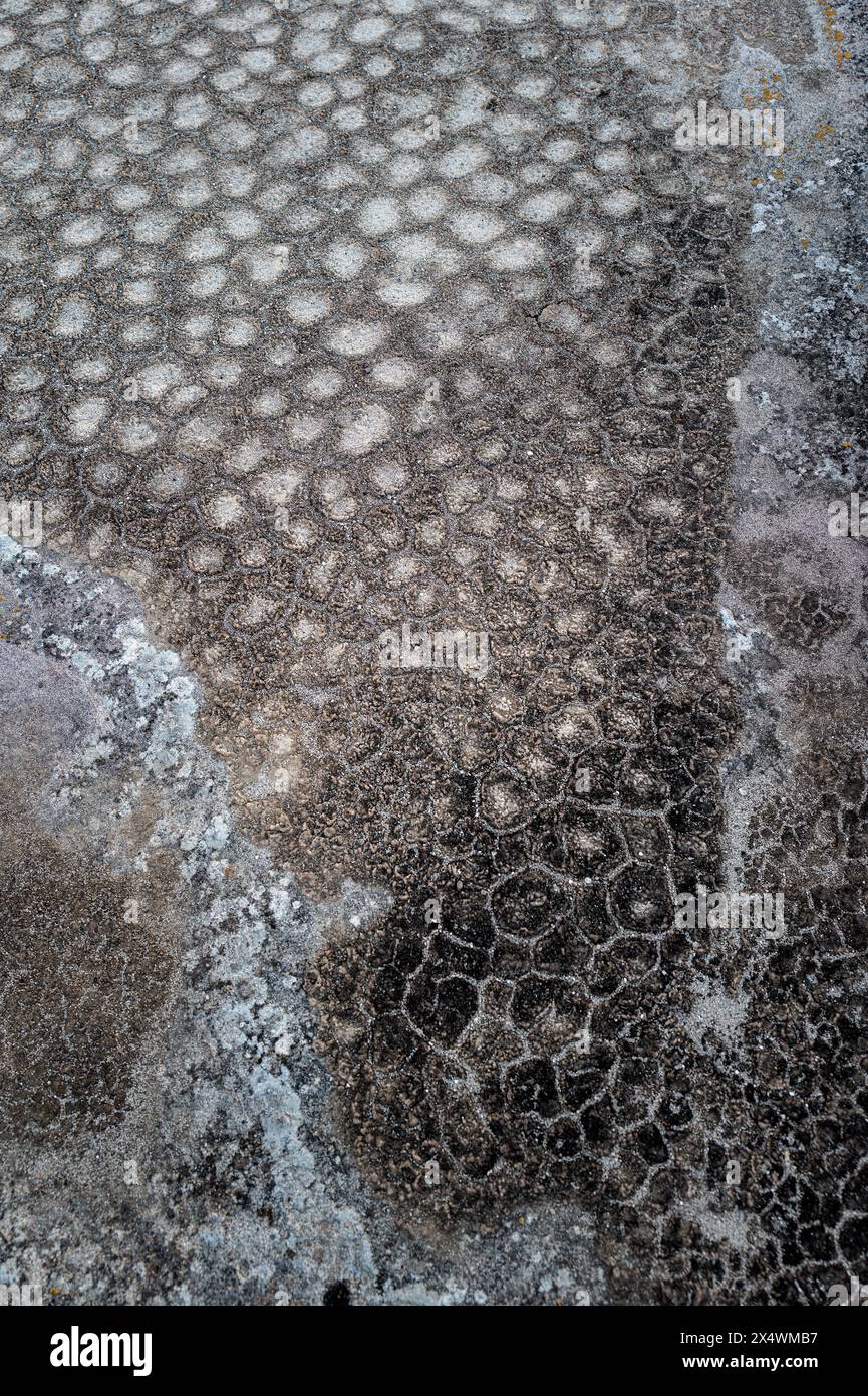 Water staining with sand and grit within rock Stock Photo - Alamy