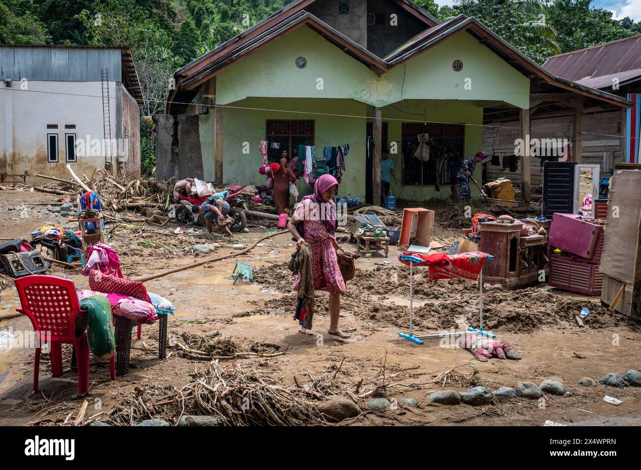 Luwu, Indonesia. 05th May, 2024. Residents look for items that can ...