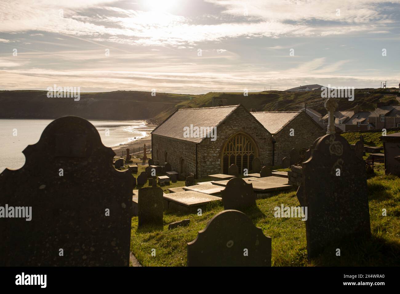 St. Hywyn's Church, Aberdaron, Wales in evening sunlight. An important ...
