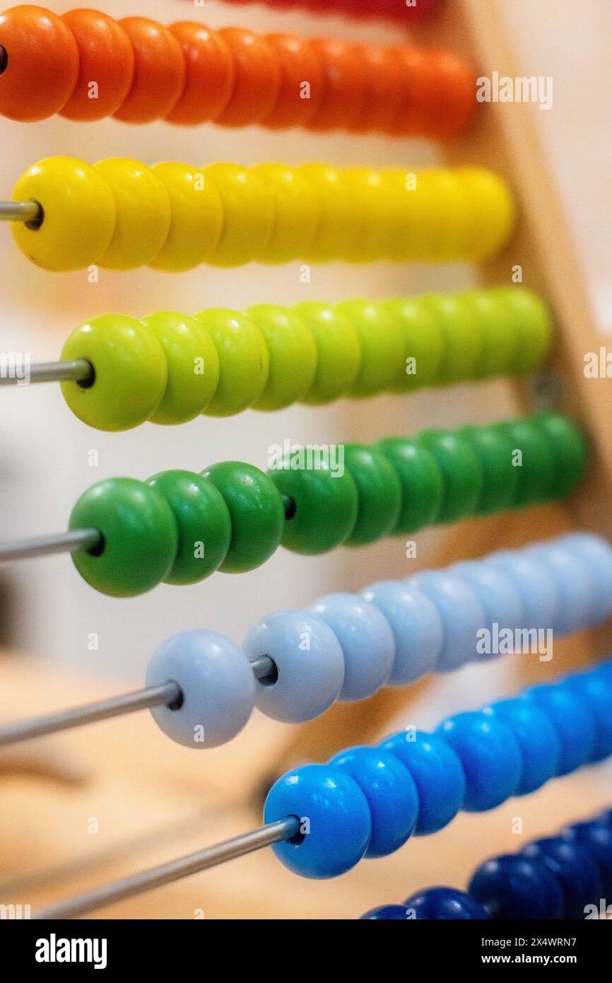 Close-up colorful school abacus bead background for kids, learning ...