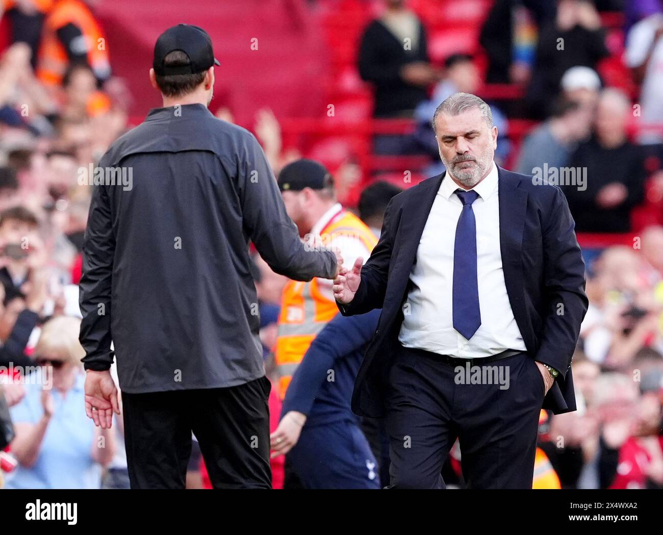 Liverpool manager Jurgen Klopp (left) and Tottenham Hotspur manager ...