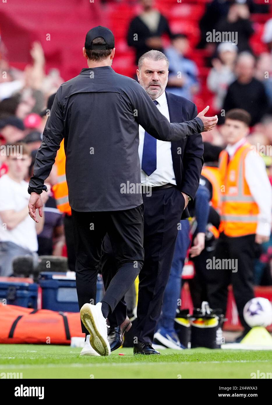 Liverpool manager Jurgen Klopp (left) and Tottenham Hotspur manager ...