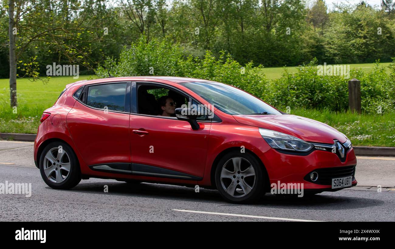 Milton Keynes,UK - May 5th 2024: 2014 red Renault Clio diesel engine ...