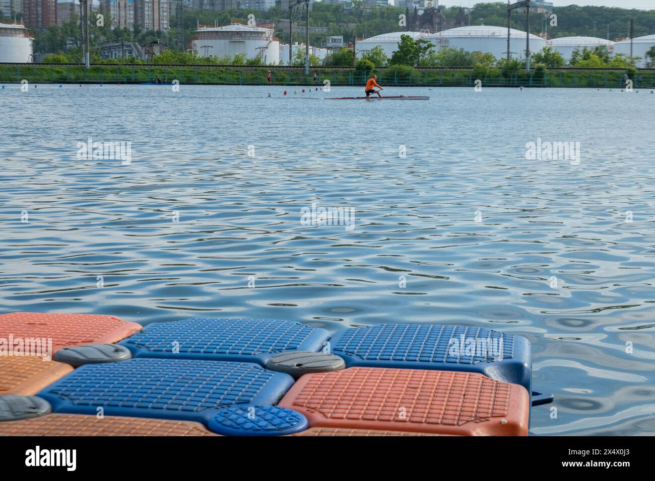 Floating pier made of composite plastic blocks on the river, sea ...