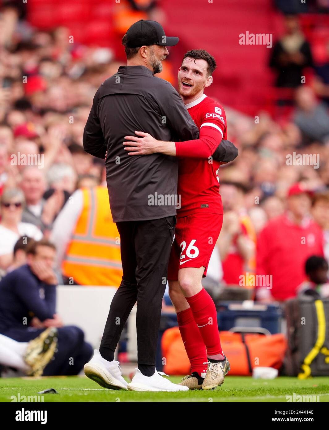 Liverpool manager Jurgen Klopp (left) congratulates Andrew Robertson as ...