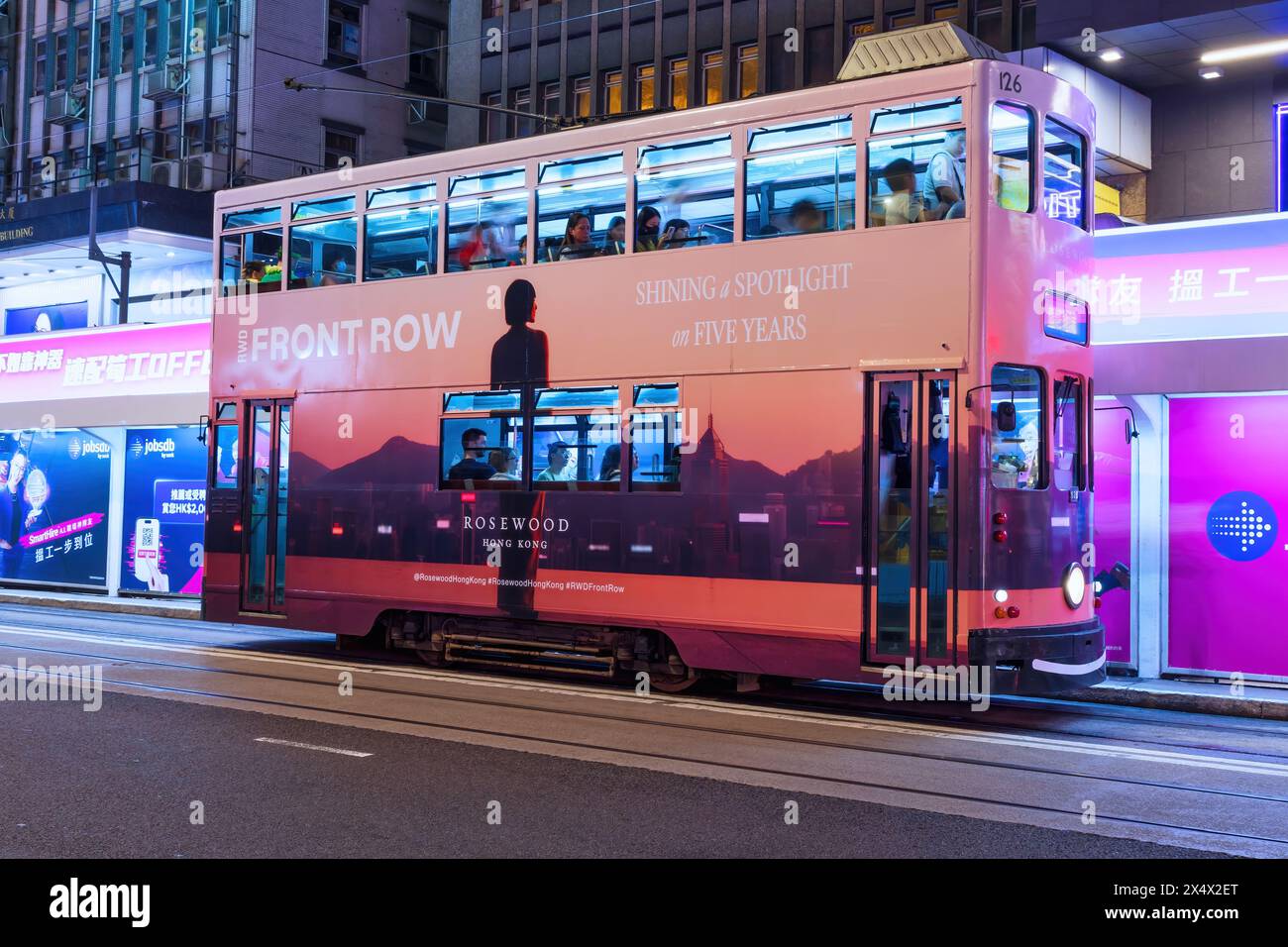 Hong Kong - April, 2024: Hong Kong Tramways is a public transport. Hong Kong Ding Ding with ...