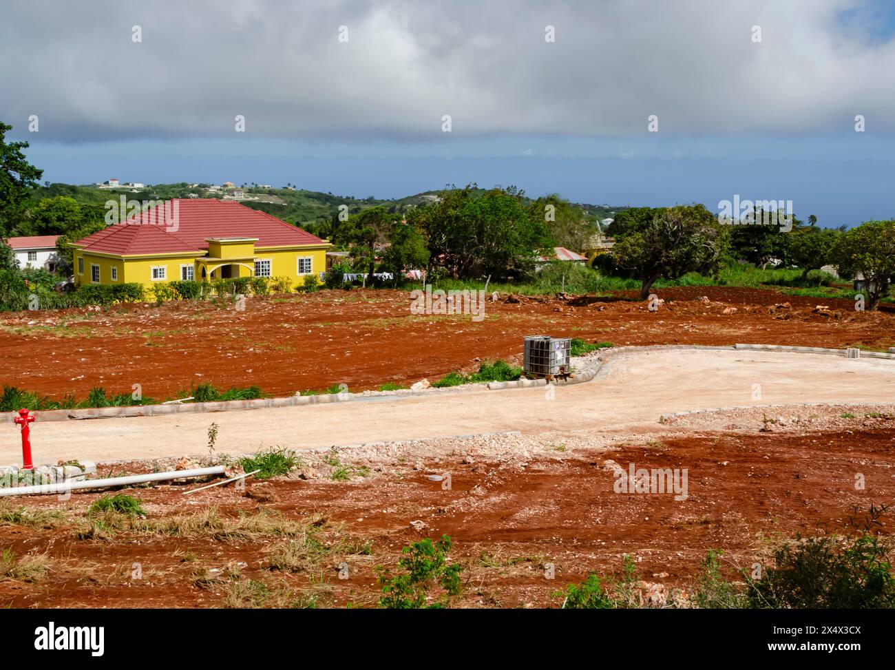 Red soil houses hi-res stock photography and images - Alamy