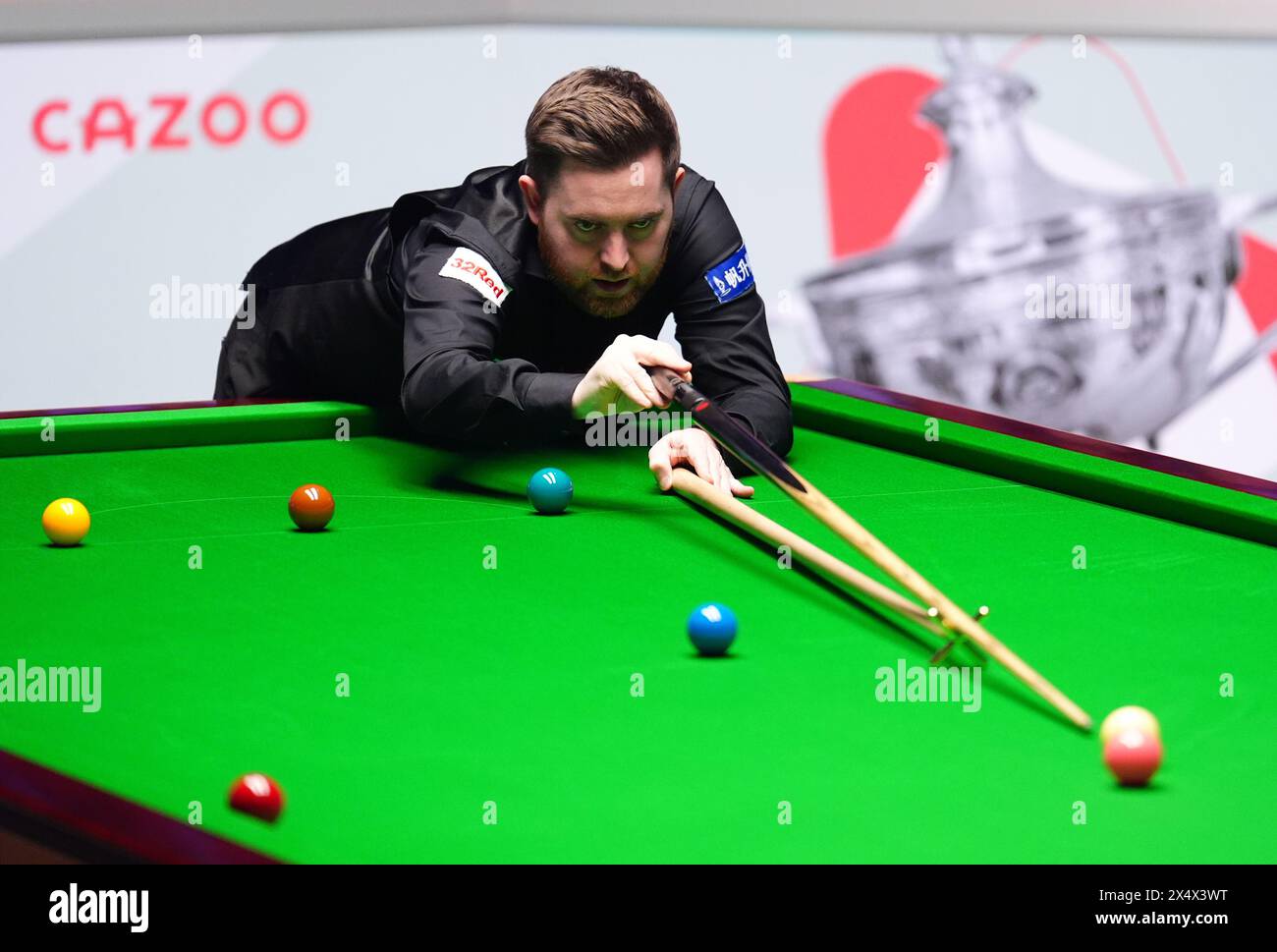 Jak Jones in action against Kyren Wilson (not pictured) during the ...