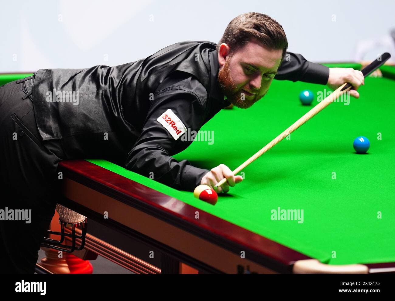 Jak Jones in action against Kyren Wilson (not pictured) during the ...