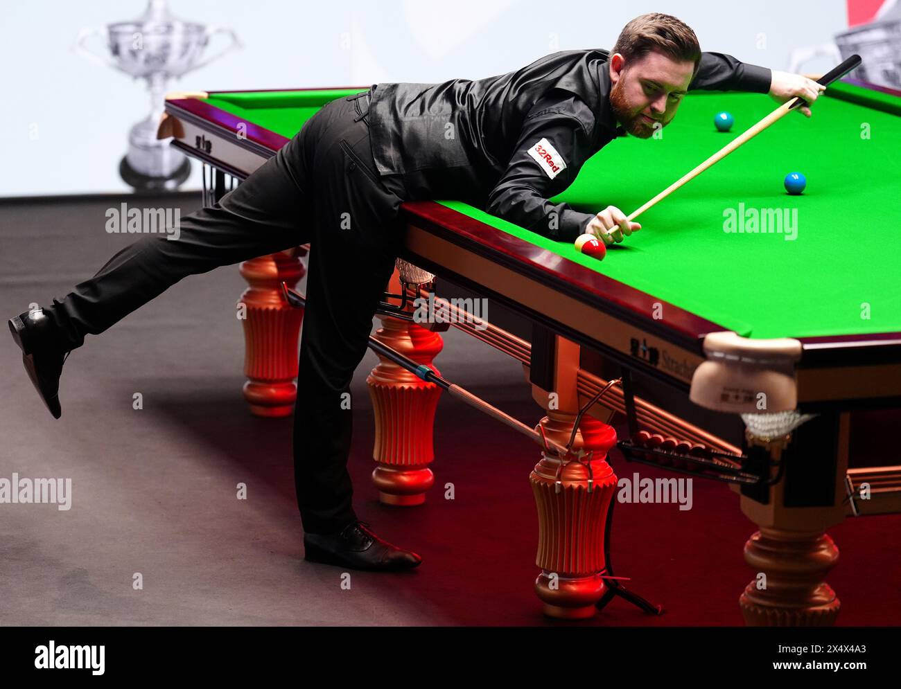 Jak Jones in action against Kyren Wilson (not pictured) during the ...