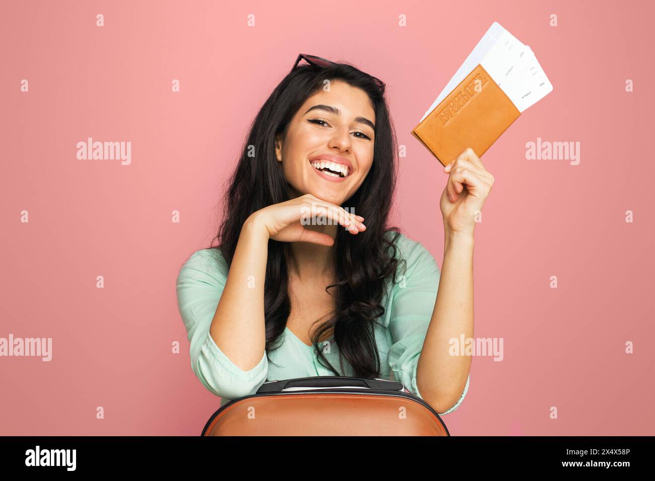 Excited Young Woman Holding Passport and Boarding Pass, Pink Background ...