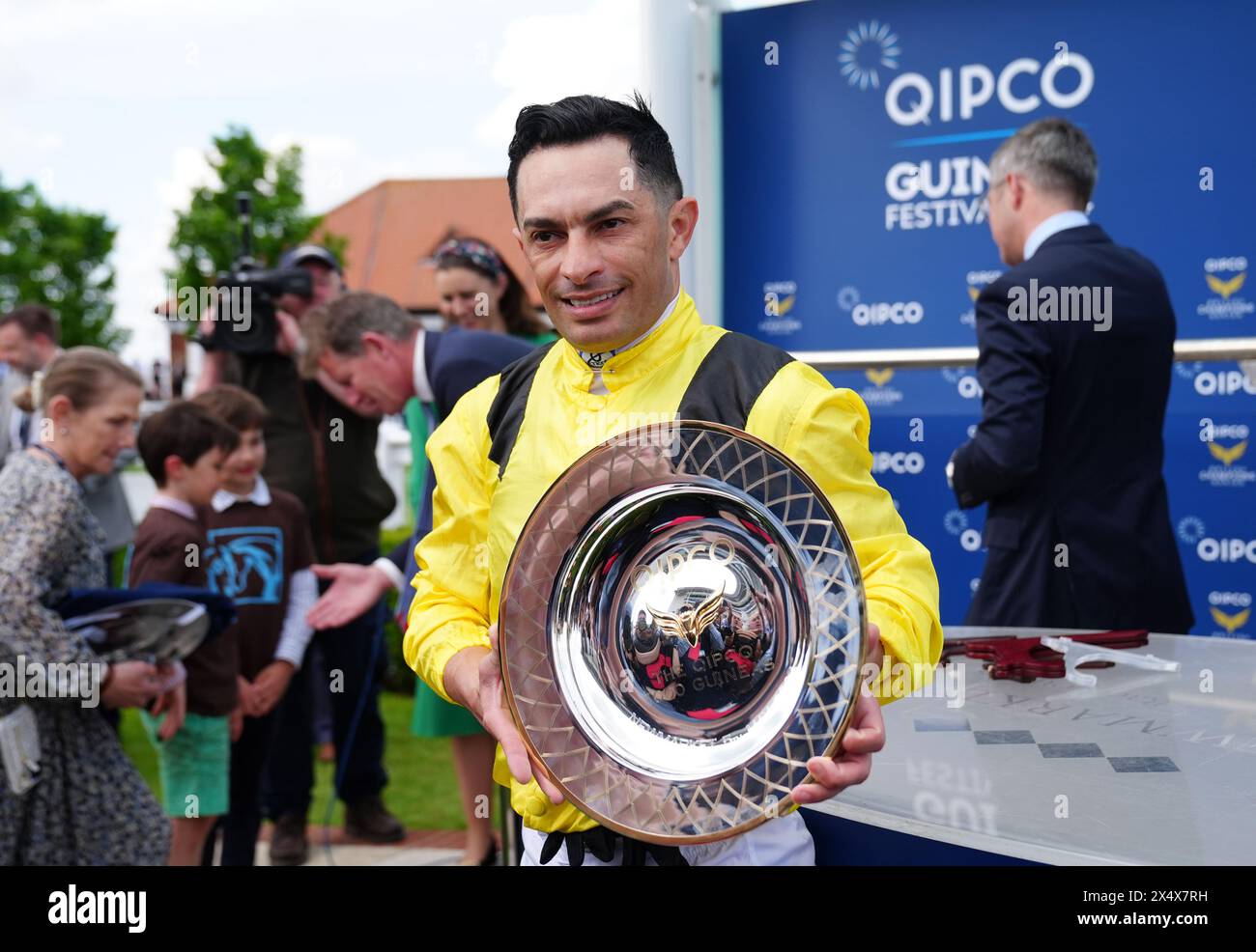Silvestre De Souza lifts the trophy after winning the Qipco 1000 ...