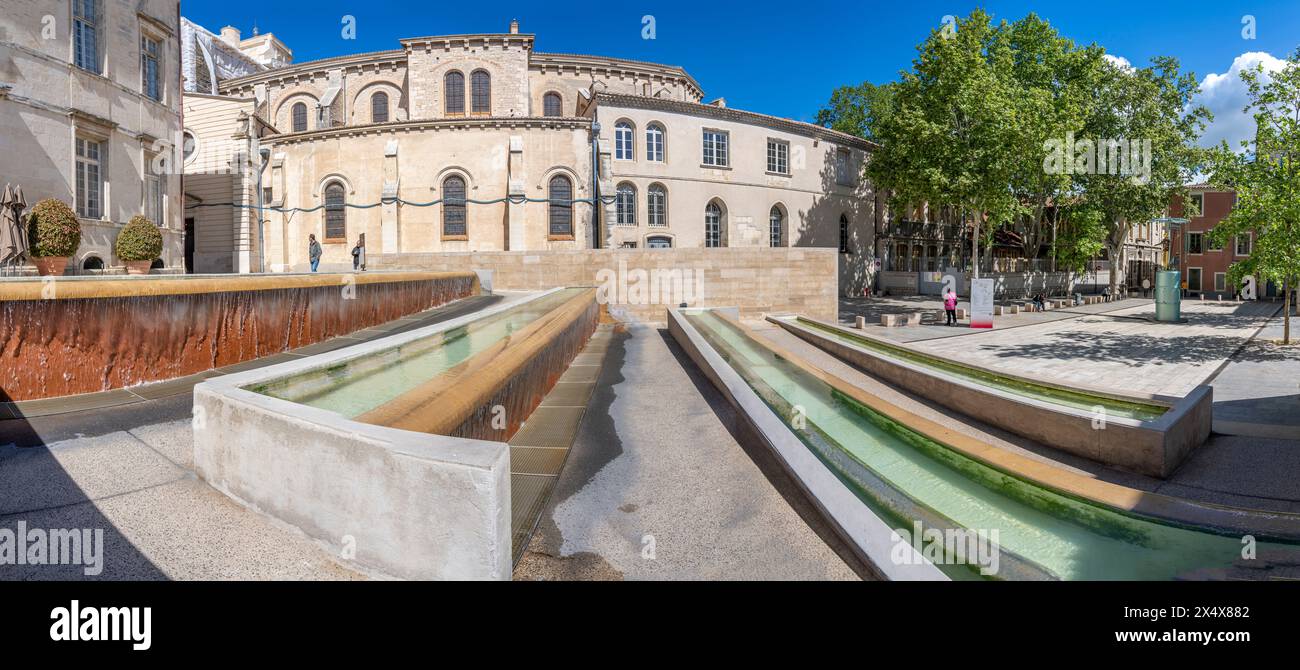 Nîmes - 04 17 2024: View of the fountain of the Place du Chapitre next ...