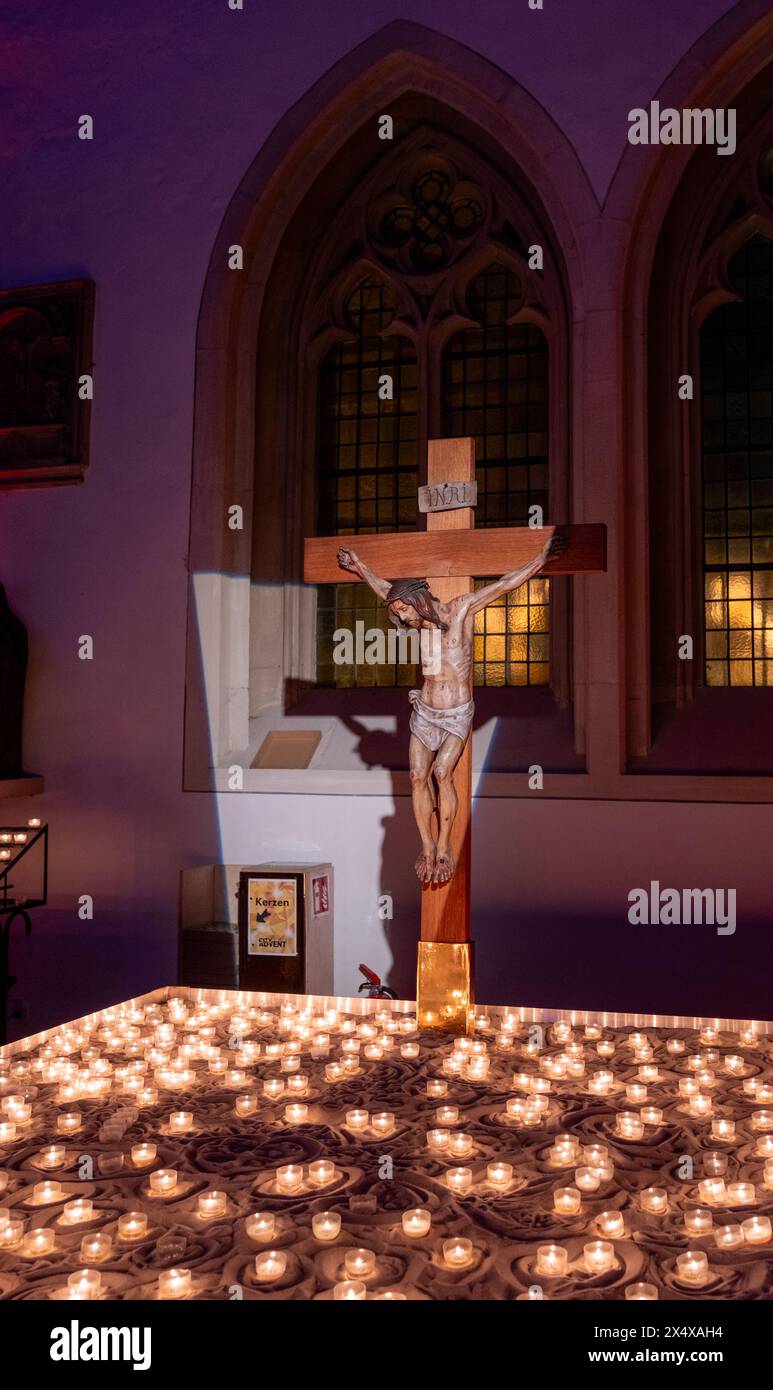 A crucified figure of Jesus in the church and his shadow reflected on ...