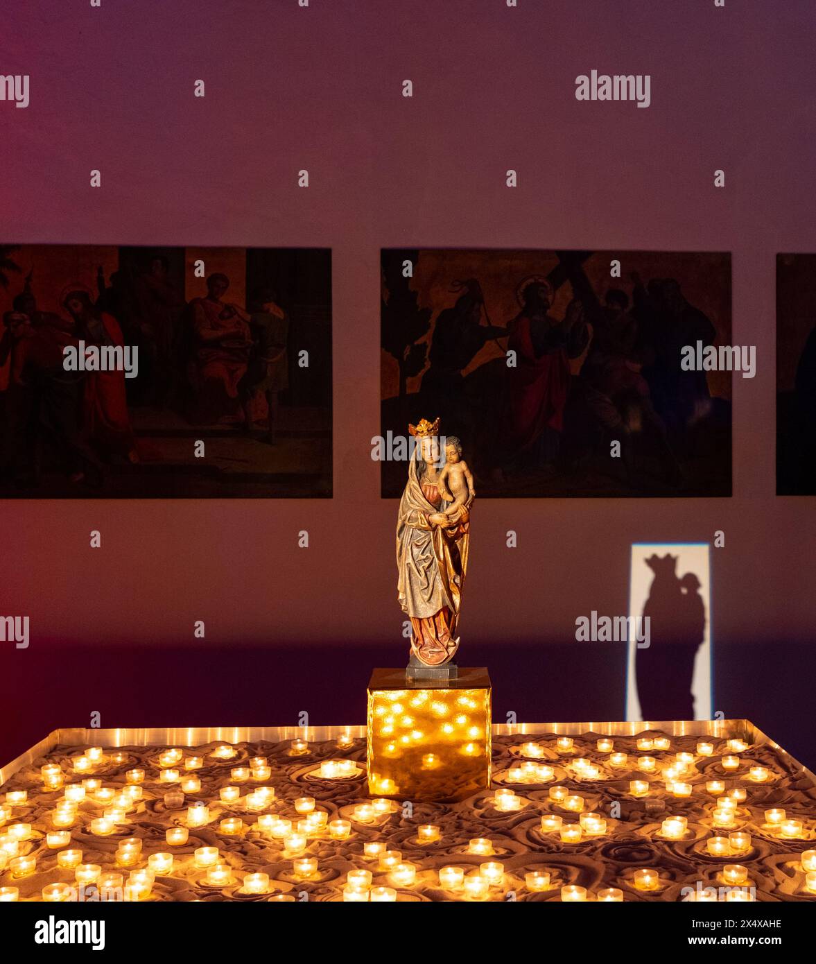 A crucified figure of Jesus in the church and his shadow reflected on ...