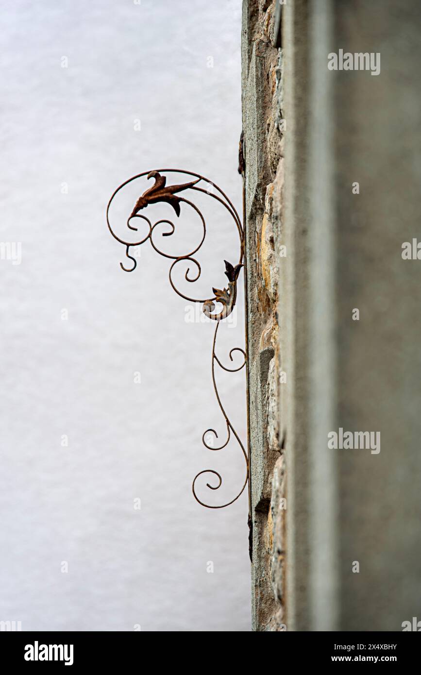 Photograpgh of old metal ornament, hook, pattern, design, facade ...