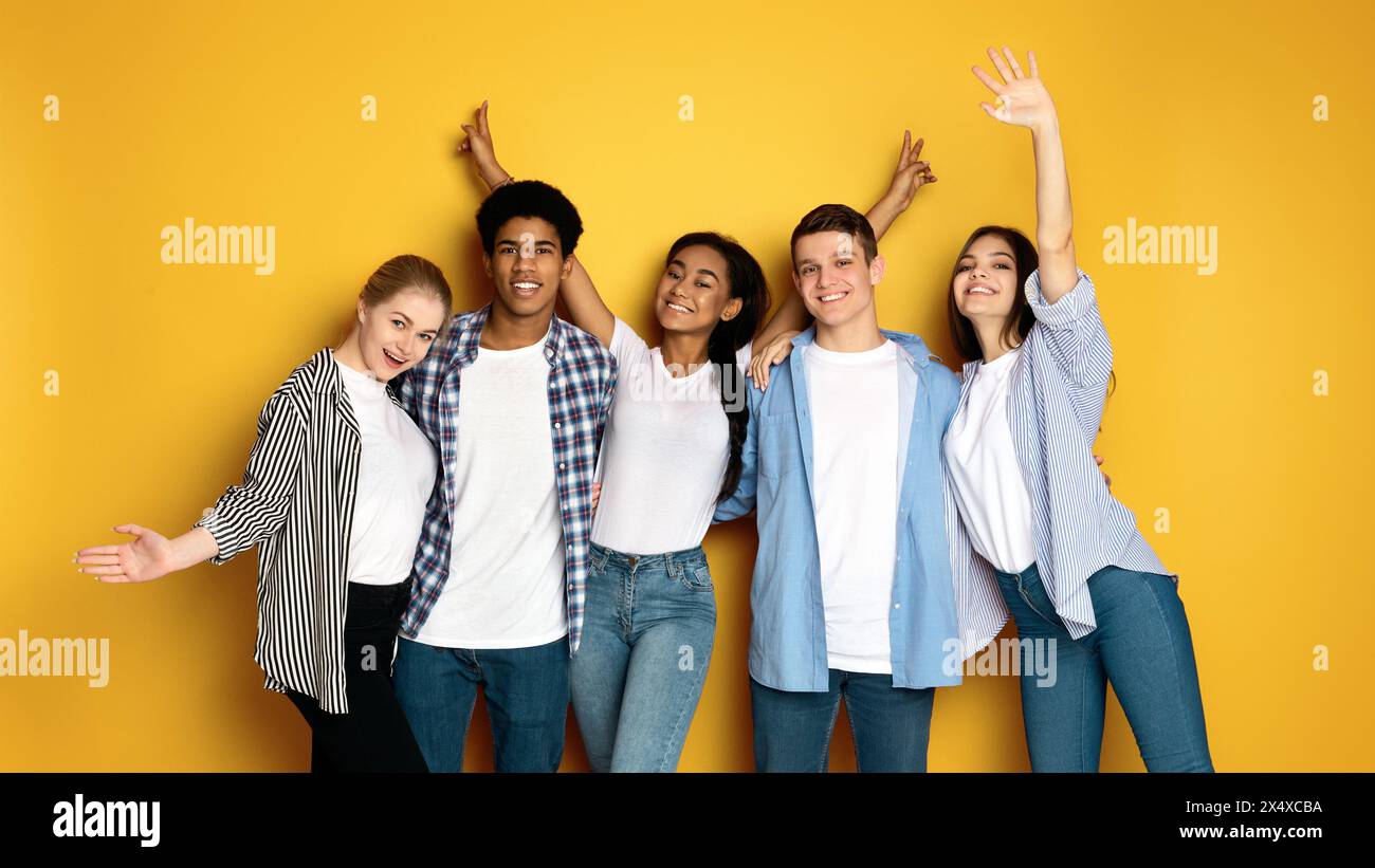 Group of Teenagers Standing Next to Each Other, Gesturing Stock Photo ...