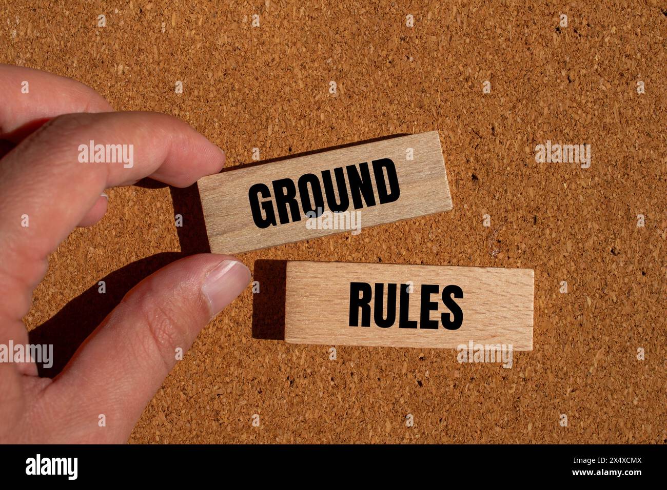Ground rules written on wooden blocks with brown background. Conceptual ...