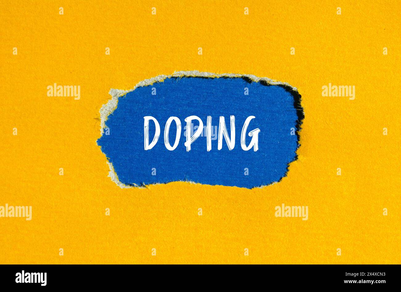 Doping word written on ripped yellow paper with blue background ... Doping word written on ripped yellow paper with blue background ...