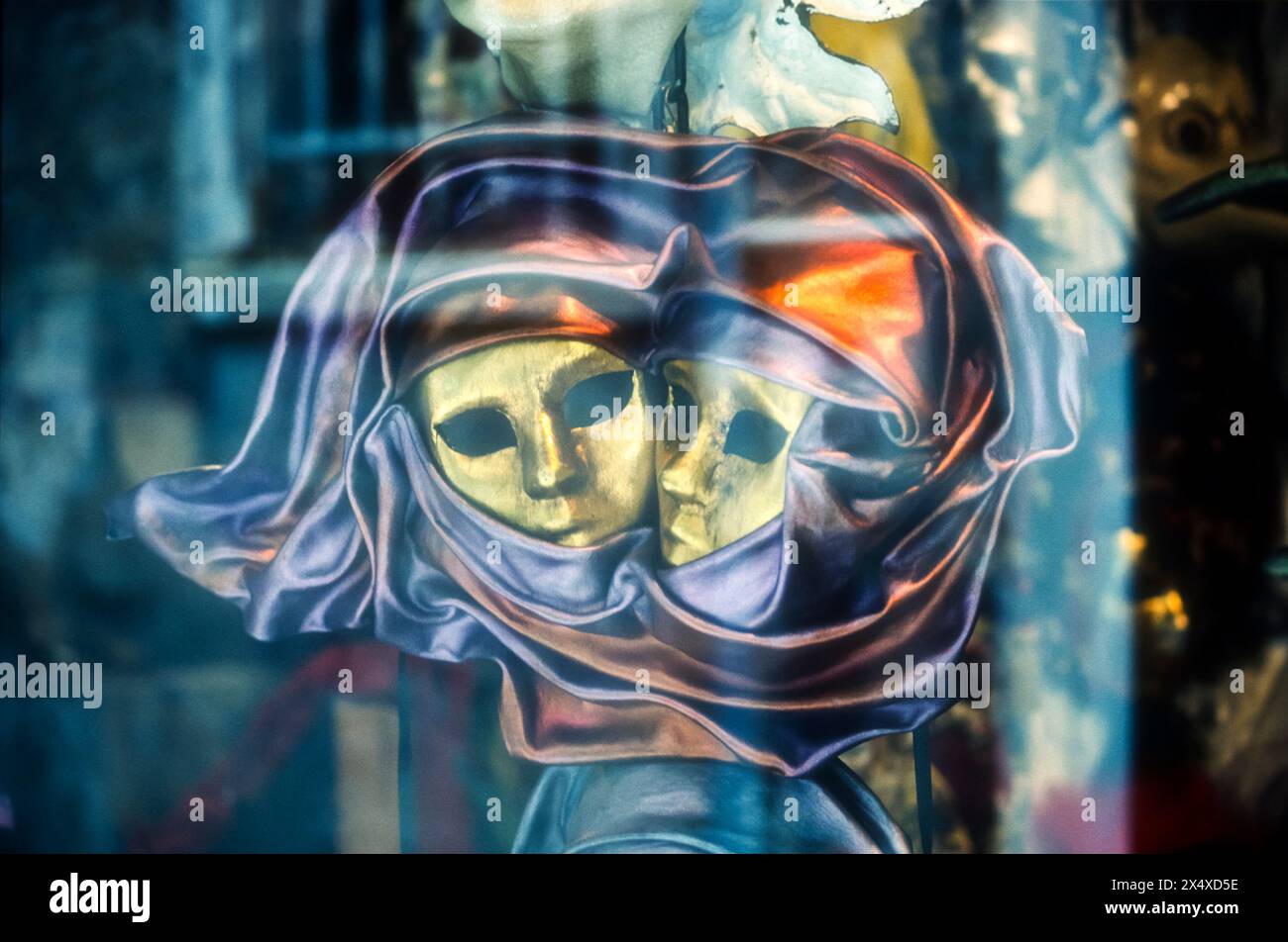 A 1990s archive photograph of carnival masks in the shop window of Ca ...