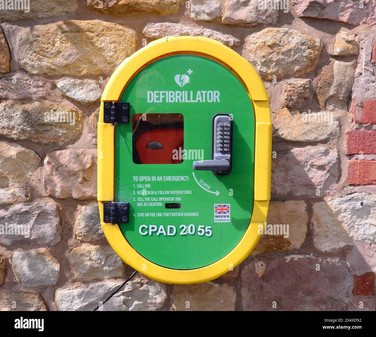 Defibrillator, device to apply an electric charge or current to the ...