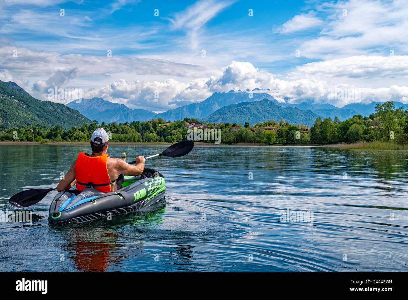 Canoeing scene on Lake Pusiano Stock Photo - Alamy