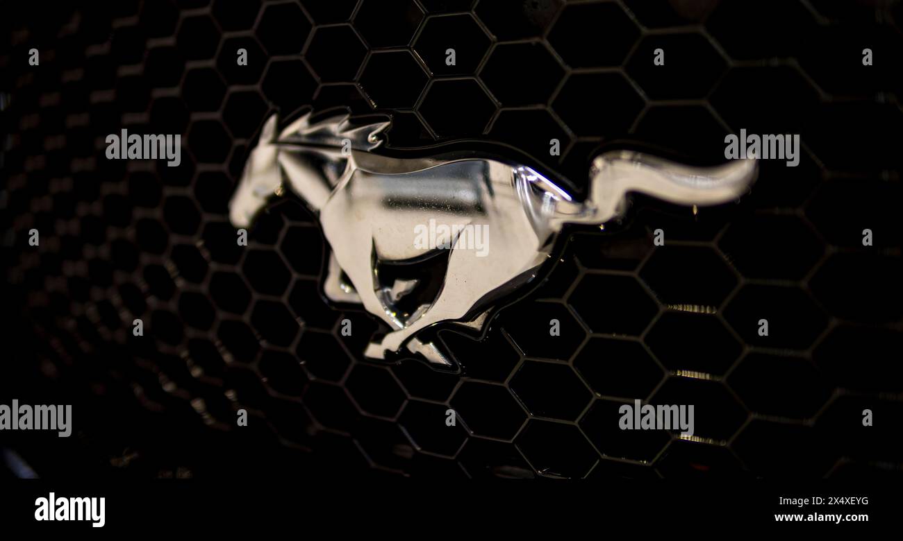 Detail of Ford Mustang logo on a car grill Stock Photo - Alamy